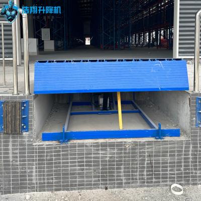 Cina 10 tonnellate scarico piastra di sbarco idraulica magazzino fisso livellatore di sbarco idraulico rampa di sbarco idraulica in vendita