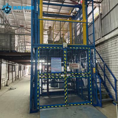 China Elevador de carga hidráulico de 1500 kg com sistema de segurança à venda