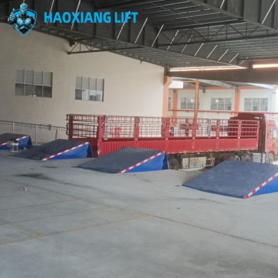 중국 조절 가능한 유압 고정식 엘리베이터 유압 동력 시스템 - 트럭 컨테이너 차고 작업 플랫폼 창고 및 물류용 고강도 판매용