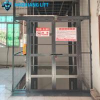 China Heavy-Duty Durable Structure Customized Warehouse Freight Elevator 7m 2-Level 500-2000kg Load Capacity for sale