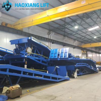 China Industrial-Grade 10-Ton Sectional Hydraulic Mobile Loading Ramp - Diamond Plate Non-Slip Surface Forklift-Compatible for sale