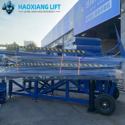 China 10 Ton Bearing Capacity Blue-Coated Sectional Mobile Yard Ramp - CE & ISO Certified, Hydraulic Container Loading/Unloading Ramp for sale