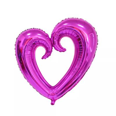 Cina Palloncini a elio in lamina di alluminio a forma di cuore da 18 pollici per la festa nuziale di compleanno in vendita