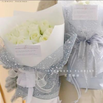 Cina Carta di avvolgimento a maglia di neve di design elegante in colori vivaci per imballaggi di fiori in vendita