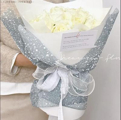 Cina Carta di avvolgimento a maglia di neve di design elegante in colori vivaci per imballaggi di fiori in vendita