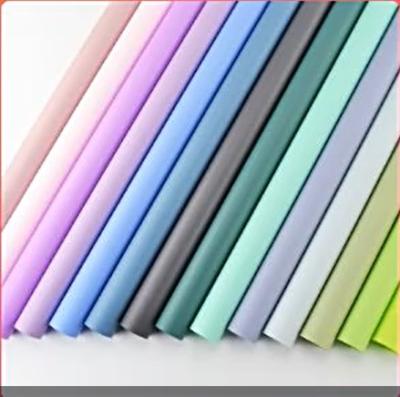 China Flower Packaging Solution Waterproof Paper Sheet with Solid Plastic Cellophane Wrapping for sale