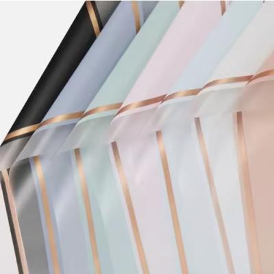 Cina Carta di imballaggio di fiori coreani Carta di imballaggio di plastica con cornice dorata Molti colori in vendita