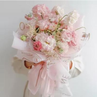 Cina Carta di imballaggio di fiori coreani Carta di imballaggio di plastica con cornice dorata Molti colori in vendita
