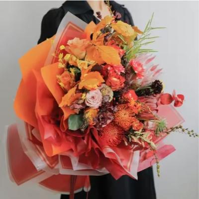 Cina Carta di imballaggio di fiori coreani Carta di imballaggio di plastica con cornice dorata Molti colori in vendita