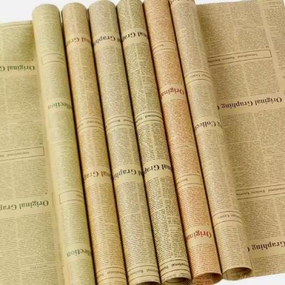 Cina Nuovo design stampa giornale carta Kraft carta di avvolgimento carta artigianale per fiori carta di avvolgimento per fiori in vendita