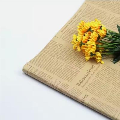 Cina Nuovo design stampa giornale carta Kraft carta di avvolgimento carta artigianale per fiori carta di avvolgimento per fiori in vendita