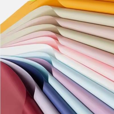 중국 도매 주문 디자인 순수한 색의 장미 선물 포장 꽃꽃차례를 위한 포장용 종이나 판매용