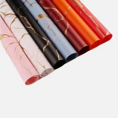 中国 卸売 金色のマーブル化 花の包装紙 防水 花材 プレゼント包装 販売のため