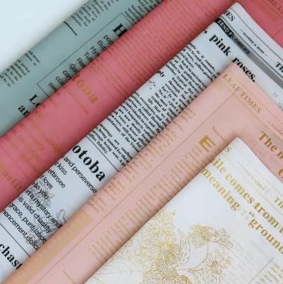 Cina 60cm*60cm Carta di avvolgimento personalizzata per fiori con stampa di lettere di fiori di moda in vendita