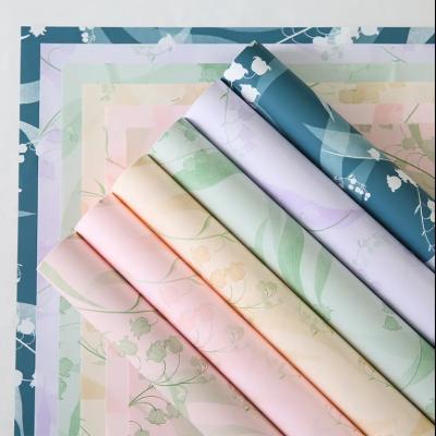 China Flower Bouquet Wrapping Paper Patterned Waterproof Floral Plastic Wrapping Paper For Fresh Flower Wholesale for sale