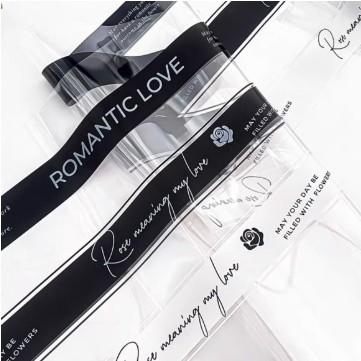 China Lizhiran Internet Celebrity Romantic English Opp Waterproof Simple Cellophane Bouquet Wrapping Paper Flower Packaging for sale