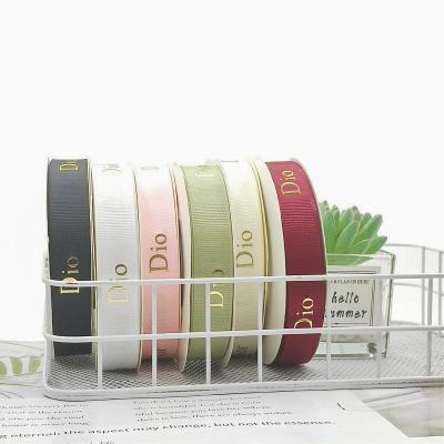 China Hot stamping thread ribbons, English holiday gifts, flower bundles, satin ribbons, fresh flowers, flower shops, baking DIY, flower shops, straps for sale