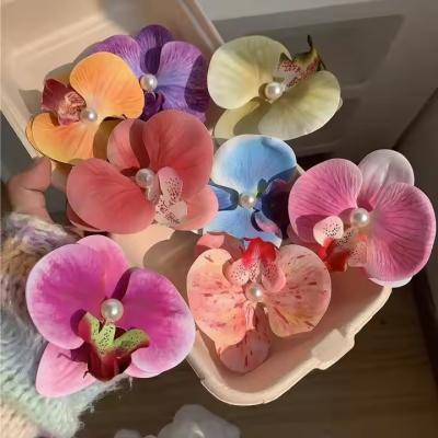 China Hot Selling Artificial Floral Orchid Hairpins Flower Hair Clip Seaside Vacation Hair Accessories for sale