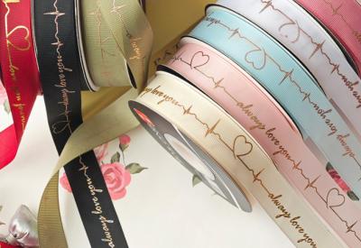 China Xi Hua Mirror Bag Flower Heartbeat Ribbon Flower Shop Flower Arrangement Hot Stamping Threaded Ribbon Valentine's Day Bouquet Bag Packaging materials for sale