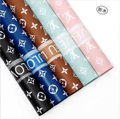 China New high-end brand flower wrapping paper, waterproof art paper, high-end rose wrapping paper, diy materials for flower bouquets in flower shops for sale
