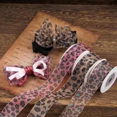 China Impressão de leopardo fita de neve DIY acessórios de cabelo de arco feitos à mão fita tecida chapéu de palha atacador fazer acessórios caixa de presente embalagem fita à venda