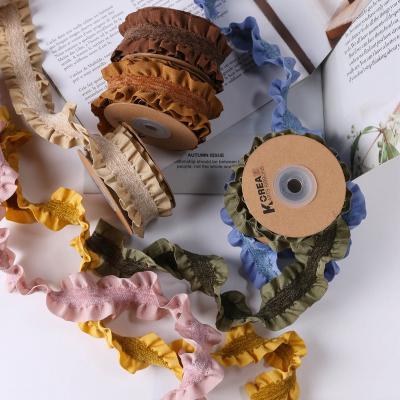 中国 双面のしわみのあるキノコの縁 毛皮の弾性リボン DIY 弓髪アクセサリー ギフト 花包装 家用繊維服 販売のため