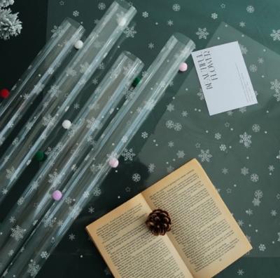 China Bloemenschaduw, kersthaarballen, dansende sneeuwvlokken, cellophane boeketten, bloemenverpakkingspapier, bloemenmaterialen, bloemenverpakkingspapier Te koop
