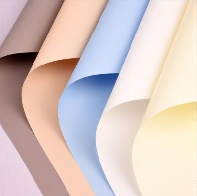 China 20 pieces of solid-color flower wrapping paper with good texture and firmness, a popular Russian round bouquet wrapping paper for sale