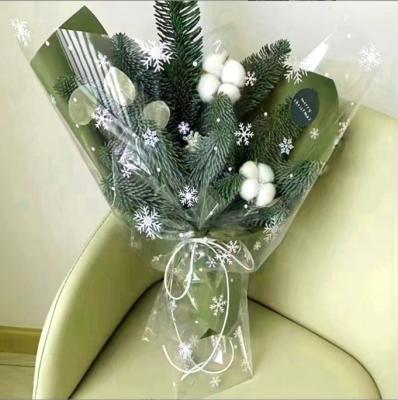China Kerstwaterdichte sneeuwvlokken cellophane bloemenwinkel, kerstvakantie bloemenboeketten, cadeautjes, appelverpakkingsfabriek groothandel en directe verkoop Te koop