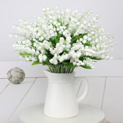 China Simulatie van groene planten, lelie van de vallei, bruiloftsboeket, huisversiering, bloemenvoorraad, witte high-end decoratie, bruiloftsversiering Te koop