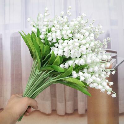 China Simulatie van groene planten, lelie van de vallei, bruiloftsboeket, huisversiering, bloemenvoorraad, witte high-end decoratie, bruiloftsversiering Te koop