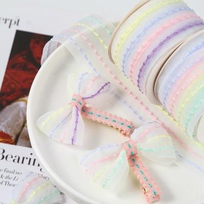 Cina 4cm/10m Quattro colori a strisce bolla trasparente nastro di gaze Accessoio per capelli Materiale ecologico per il bricolage imballaggio del bouquet di archi in vendita