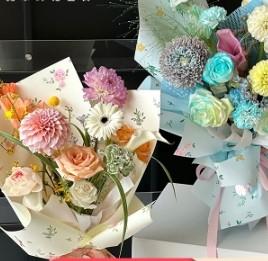 中国 カラフルなフローラルテクスチャ防水包装紙 ファッション性と耐久性 販売のため