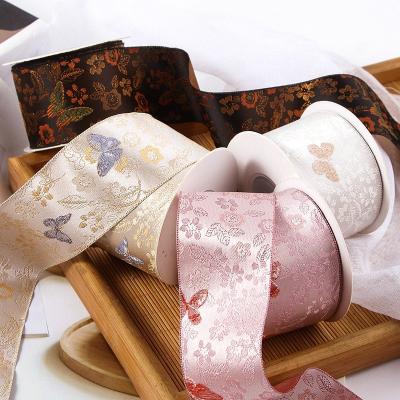 China Stil Einseitige Schmetterlingsblumenbroderie Rand Satinband Handgefertigt Bogen Kopfband Haarklemm Accessoires Blumenkrawatten zu verkaufen