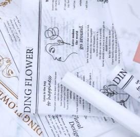 中国 スノーペア紙 英語新聞 防水花の花の包装紙 販売のため