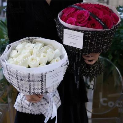 China Kleine Xiang-stijl bloemenboeket verpakkingsstof, bloemen cadeau verpakking wonder, high-end licht luxe stof, bloemen materialen groothandel Te koop