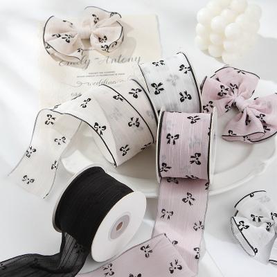 Cina Accessori per capelli con nastro di neve con stampa a farfalla in poliestere ecologico per confezioni regalo fai-da-te con fiocchi e fiori in vendita