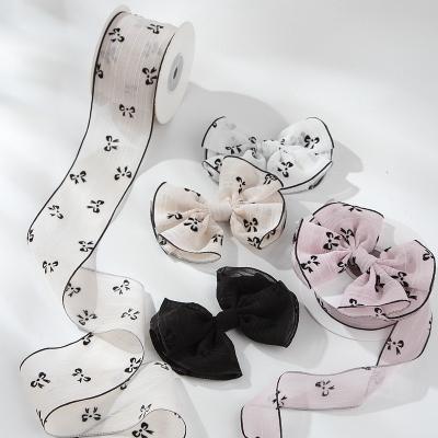 Cina Accessori per capelli con nastro di neve con stampa a farfalla in poliestere ecologico per confezioni regalo fai-da-te con fiocchi e fiori in vendita