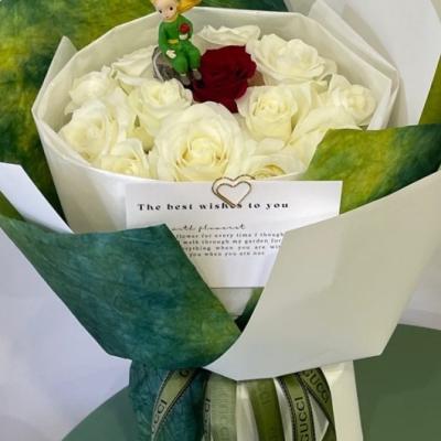 Cina Bouquet di fiori in carta lavata all'inchiostro, carta da involucro decorativa del Piccolo Principe, imballaggi in carta piatta con texture di pietra, fiori freschi, materiali da fioraio fatti a mano in vendita