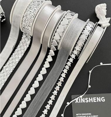 Китай Рождественские ленты и цветочные букеты серии Silver для аксессуаров для волос, ширина 2,5 см продается