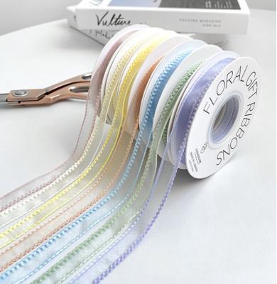 Cina Coreano Wave Edge Snow Silk Ribbon Imballaggio floreale Materiale fai da te Bouquet Binding Flowers Strisce decorativa avanzata in vendita