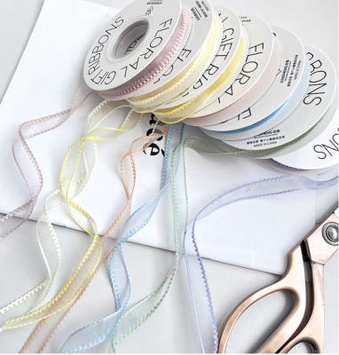 Cina Coreano Wave Edge Snow Silk Ribbon Imballaggio floreale Materiale fai da te Bouquet Binding Flowers Strisce decorativa avanzata in vendita