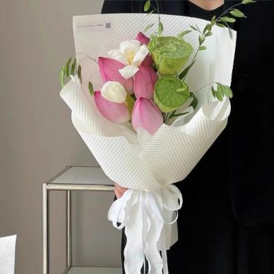 China 3D Artistic Embossed Waterproof Flower Art Kraft Paper Decorative Gift Packaging Florist Wrapping Paper for Bouquet Packing in Many Colors for sale