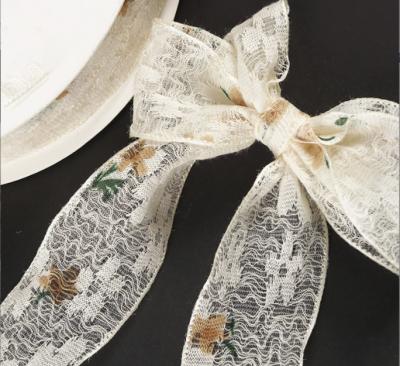 Cina Nastro di pizzo verde da 2,5 cm/10 m, materiali floreali per il bouquet di garza di bellezza del giorno di San Valentino Qixi in vendita
