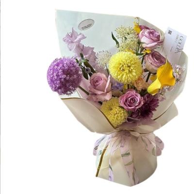China DIY Flower Shop Art Qixi Golden Ion Flower Wrapping Paper on Hansu Paper with Golden Edge Jelly Film for sale