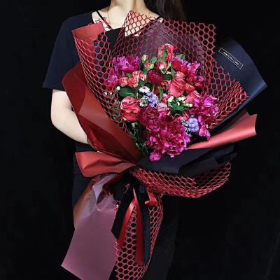 China Circle Holes Florist Wrapping Paper Mesh Rolls Waterproof 60cm*5Y 70-80gsm for sale