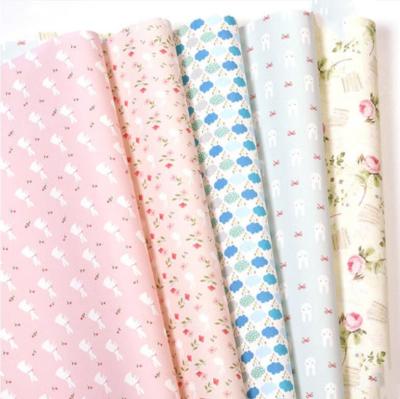 China Recycled Yellow Flower Patterned Kraft Wrapping Paper 2m Wrapping Paper for sale