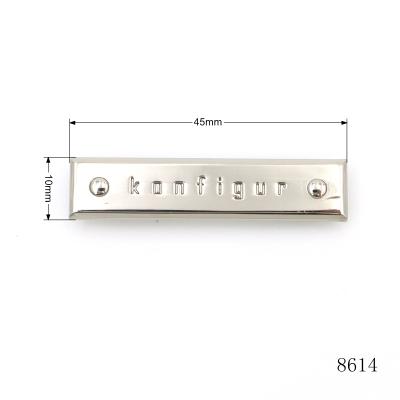 China Engraving Metal Logo Tag Handbag Custom Metal Name Plates Corrosion Resistant for sale