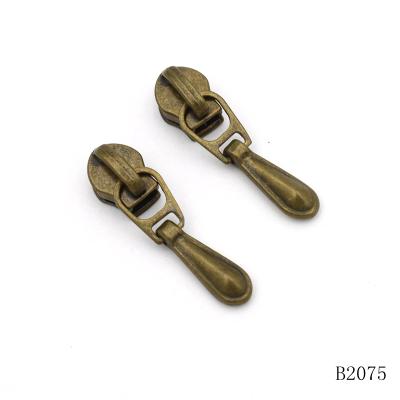 China OEM ODM Metal Zipper Puller Small Zipper Pulls For Handbags for sale