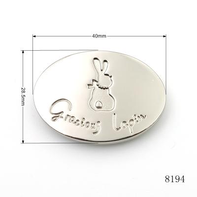 China Shiny Silver Plating Bag Metal Oval Label Plate Custom Brand Metal Engraved Logo Plate for sale